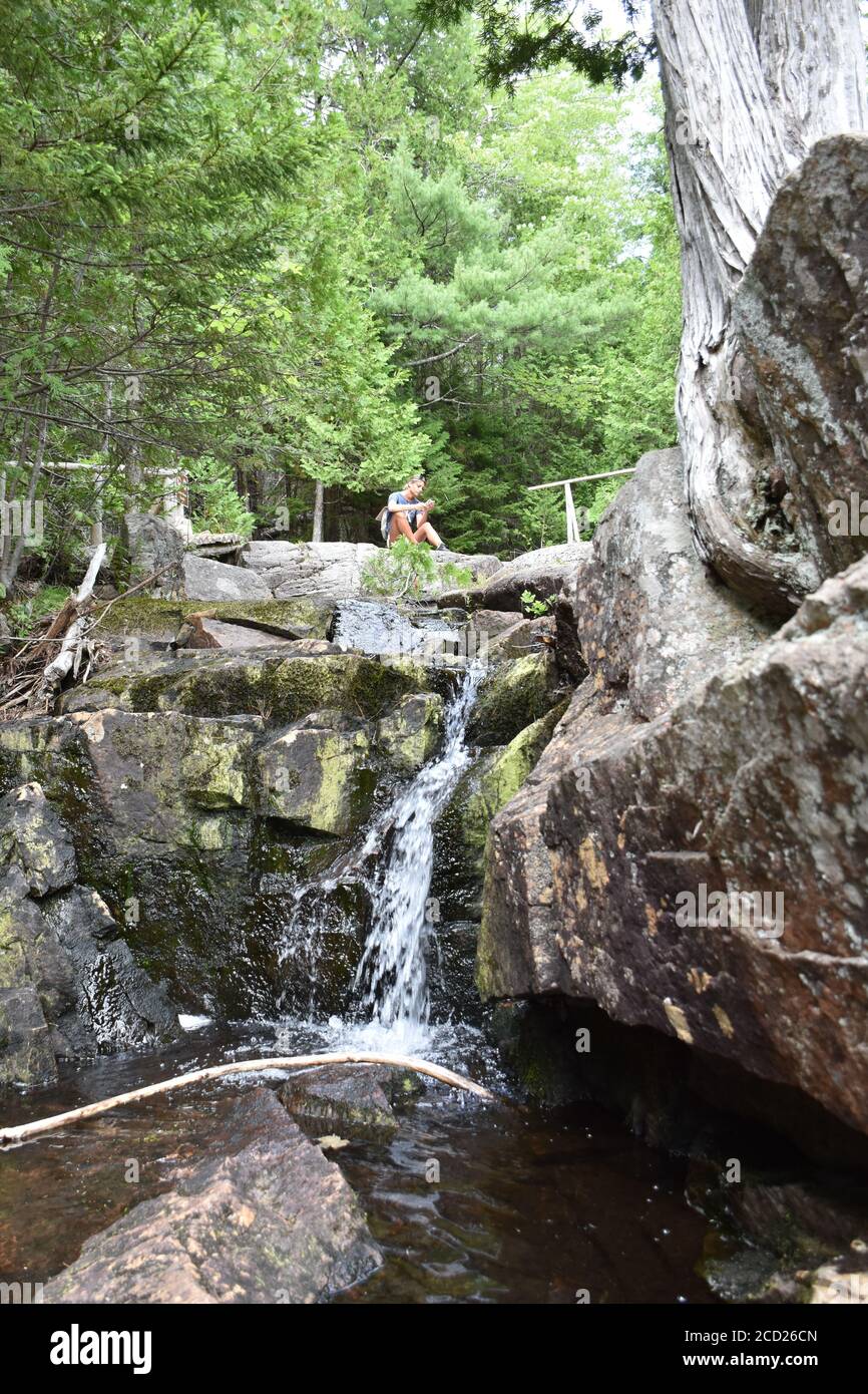 Girl near waterfall hi-res stock photography and images - Alamy