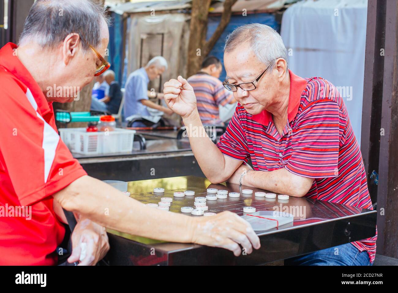 Xiangqi being Played in Singapore Stock Photo - Alamy