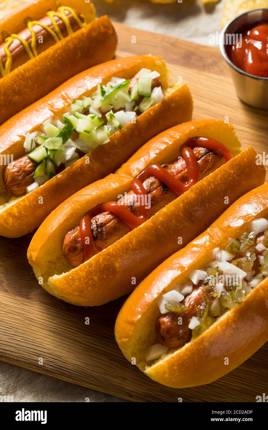 Healthy Homemade Turkey Hot Dogs with Ketchup Mustard and Onion Stock ...