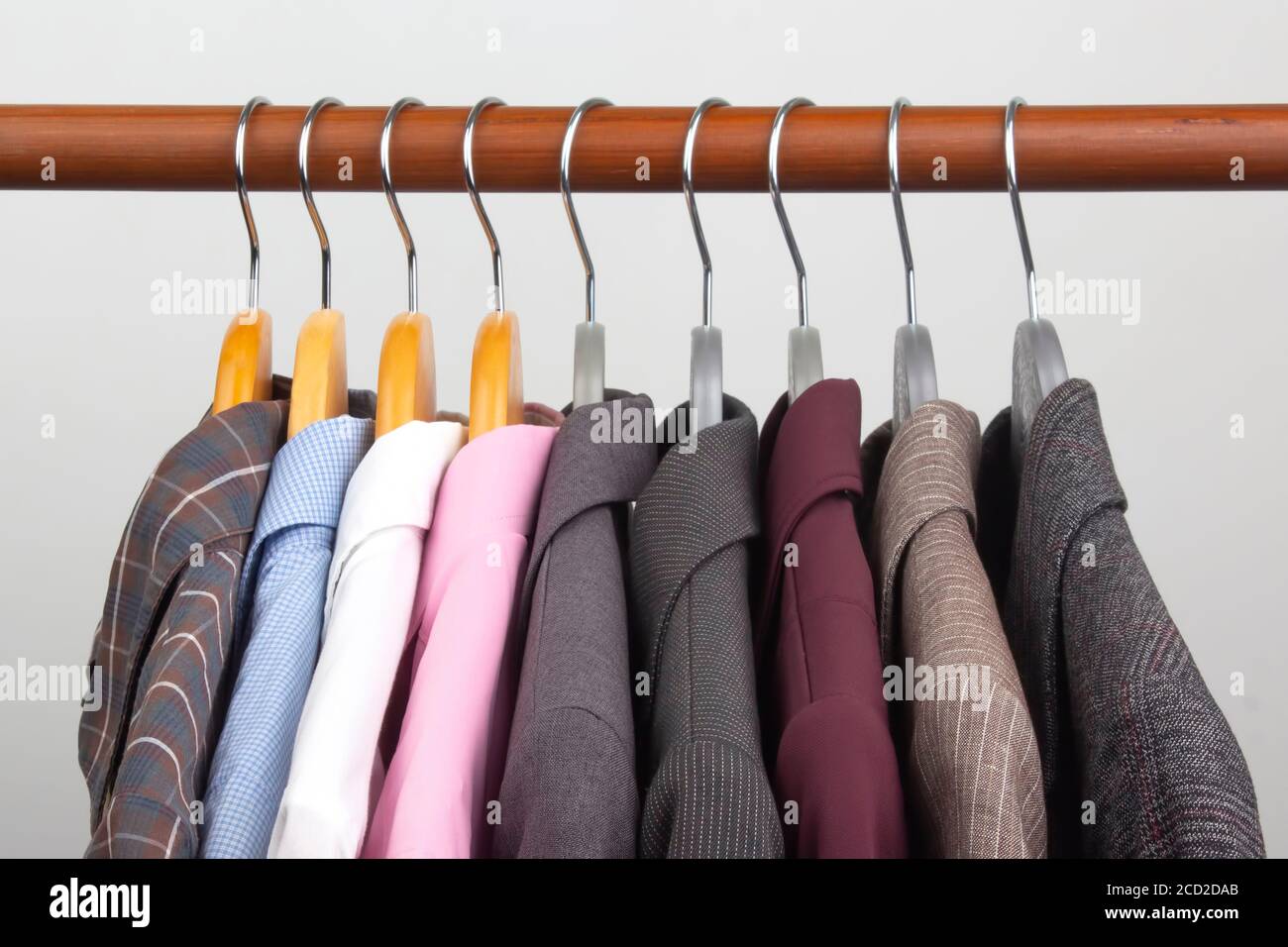 Suit jacket hanging on office hi-res stock photography and images - Alamy