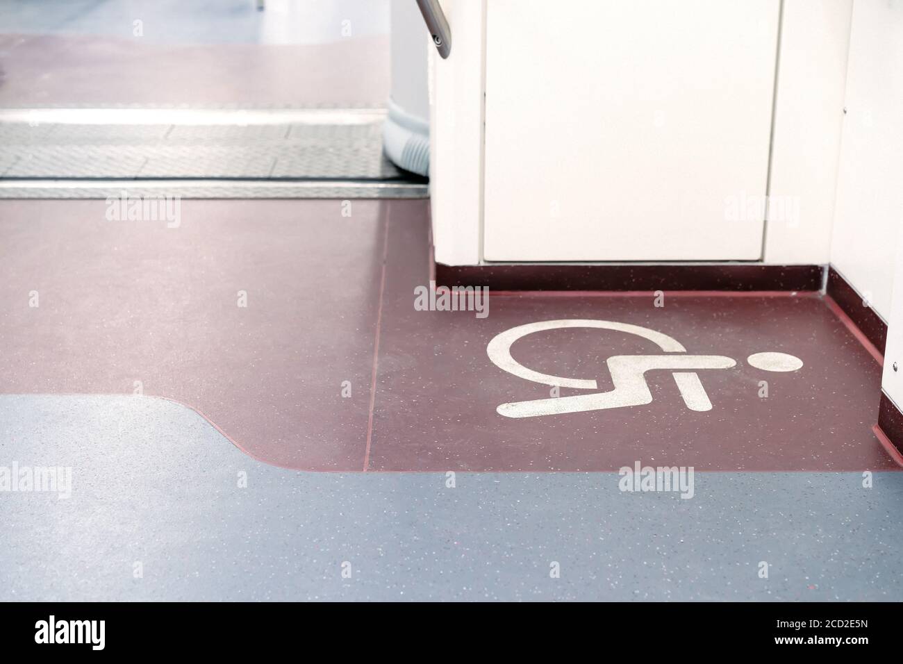 Handicap wheelchair signed on the corner inside the train Stock Photo ...