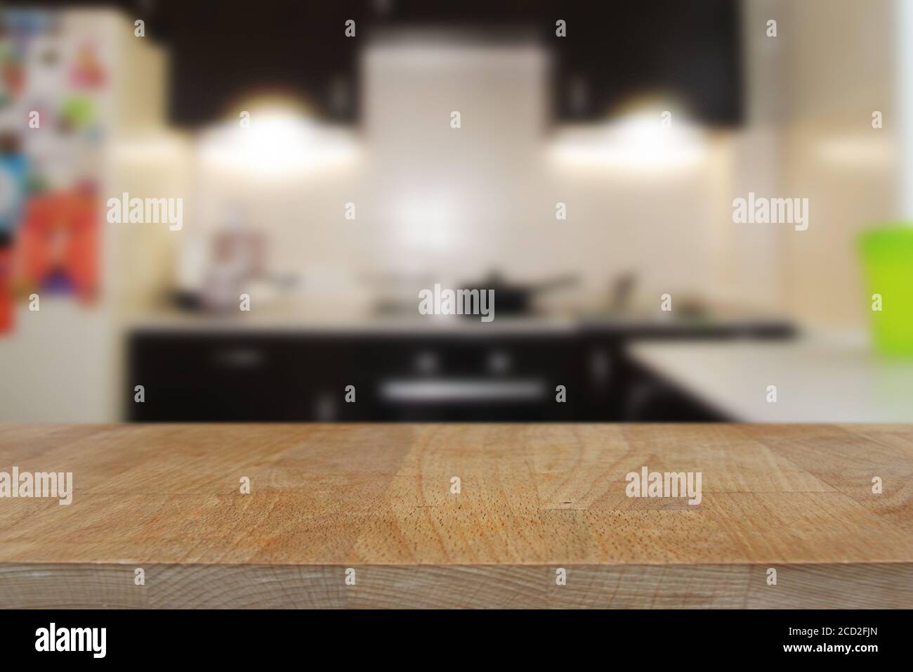 Wooden table on kitchen interior background Stock Photo - Alamy