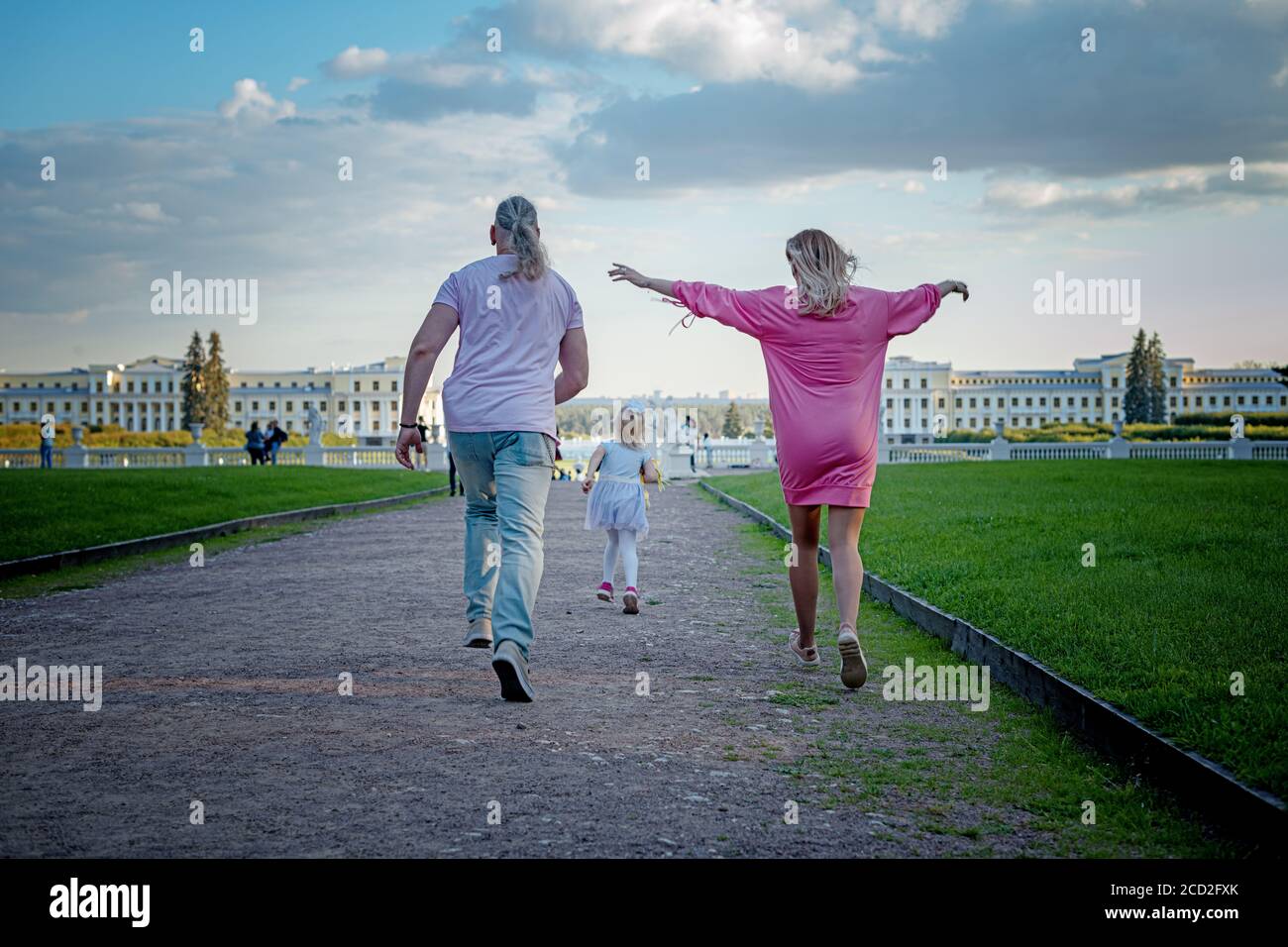 Four children running hi-res stock photography and images - Alamy