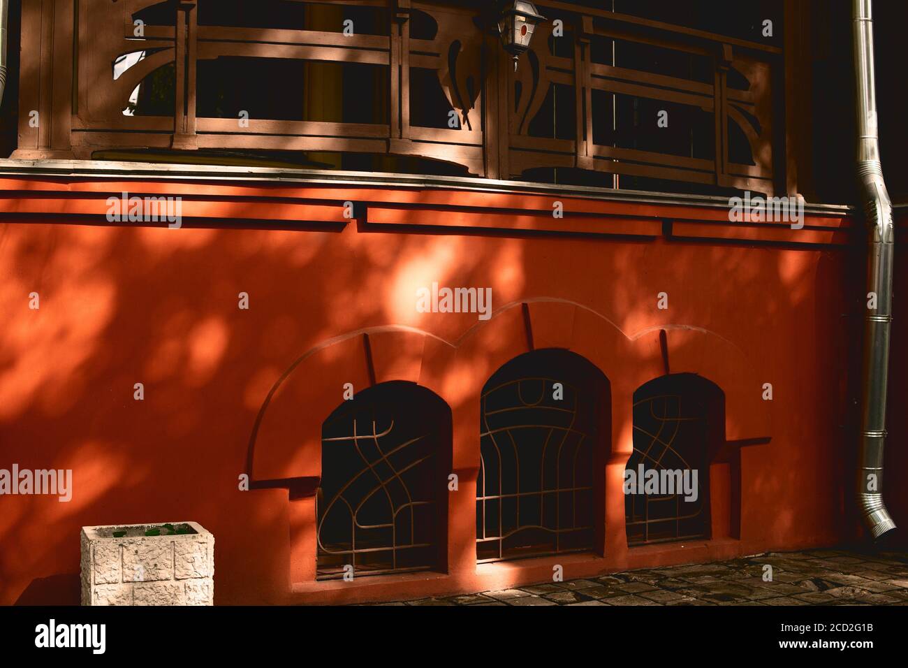 Facade of the historic building yellow-orange building with window ...