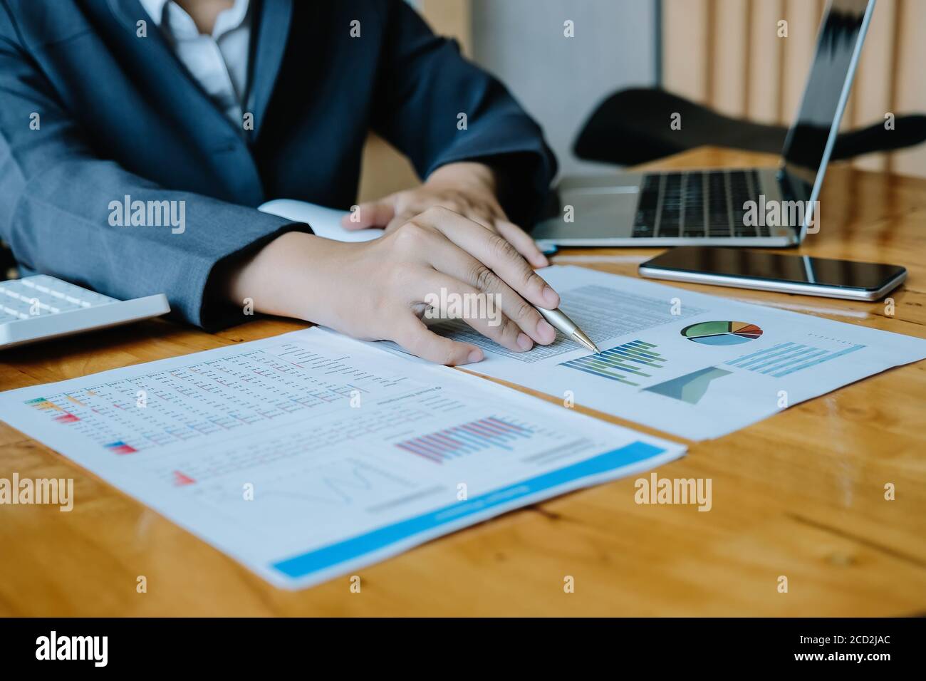 Business man investment consultant analyzing company annual financial ...