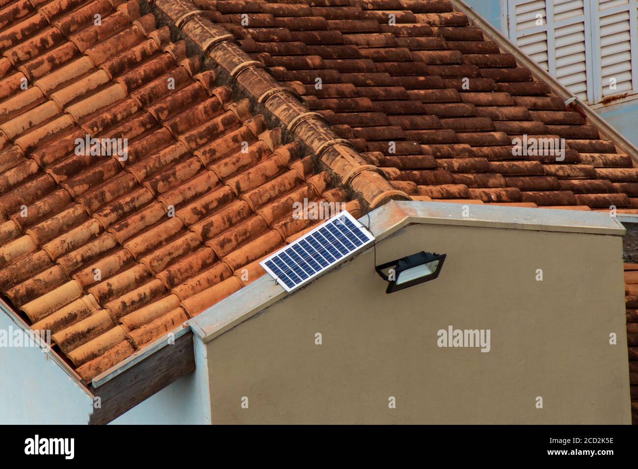 Solar panel powering light in a house working on solar power Stock ...
