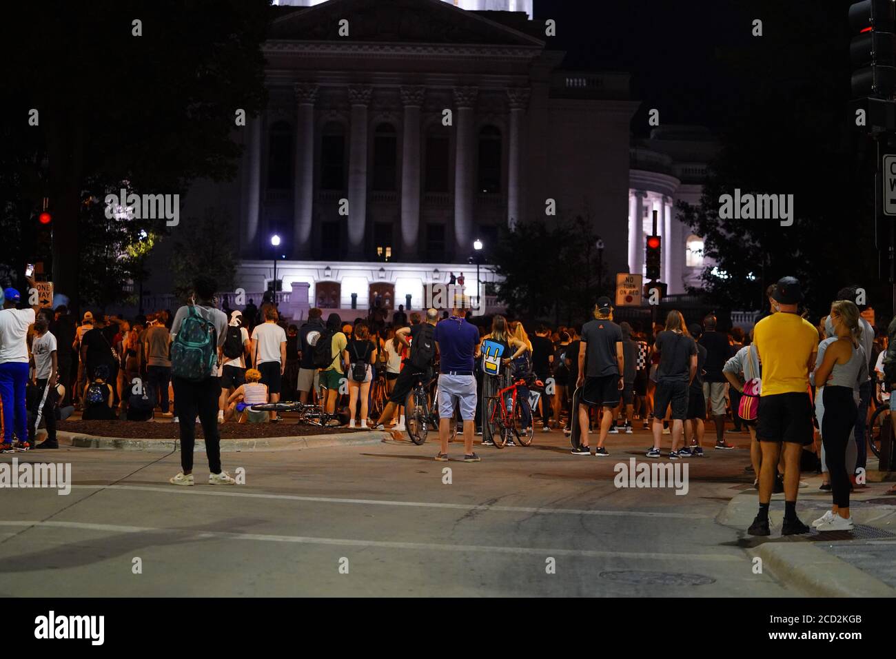 Rioters in the streets of wisconsin state capitol madison light fires ...