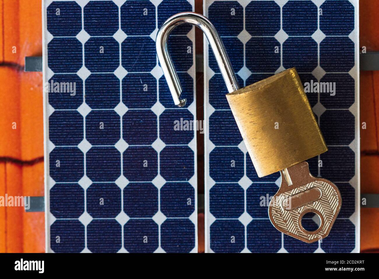 Padlock with key on photovoltaic solar panel on black background Stock ...
