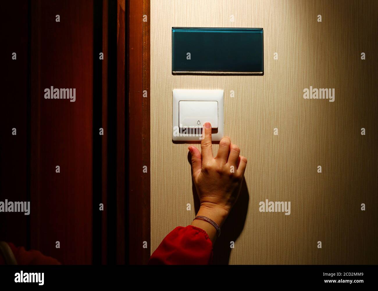 Hand Pressing Bell High Resolution Stock Photography and Images - Alamy