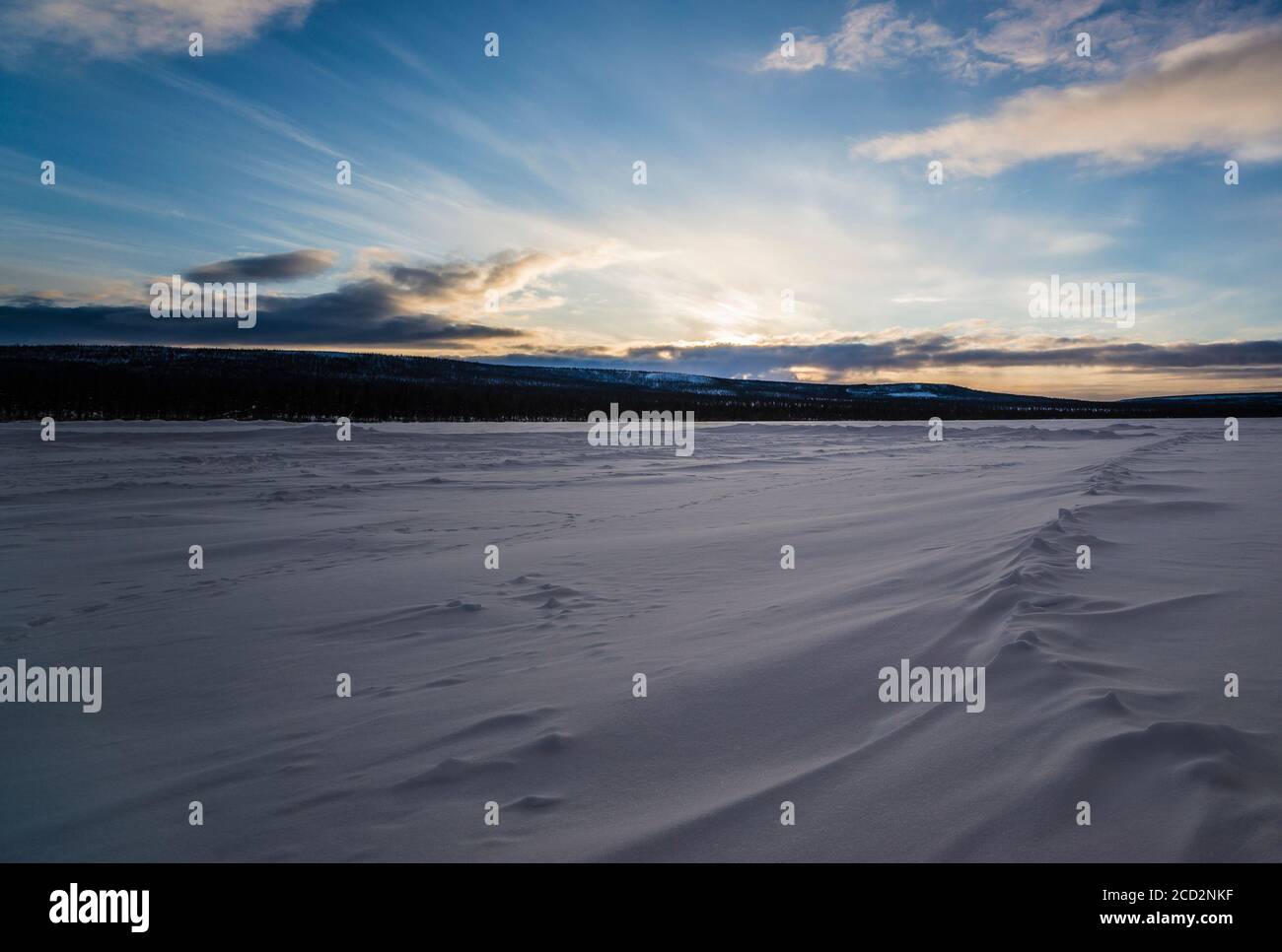 Winter snowscape with forest, trees and snowy cliffs. Blue sky. Winter ...