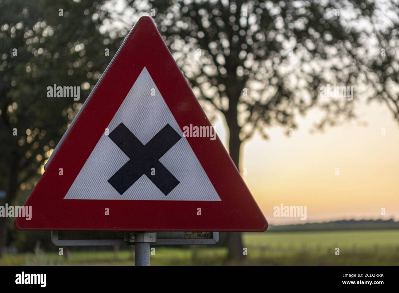 Crossroad intersection triangle traffic sign hi-res stock photography ...
