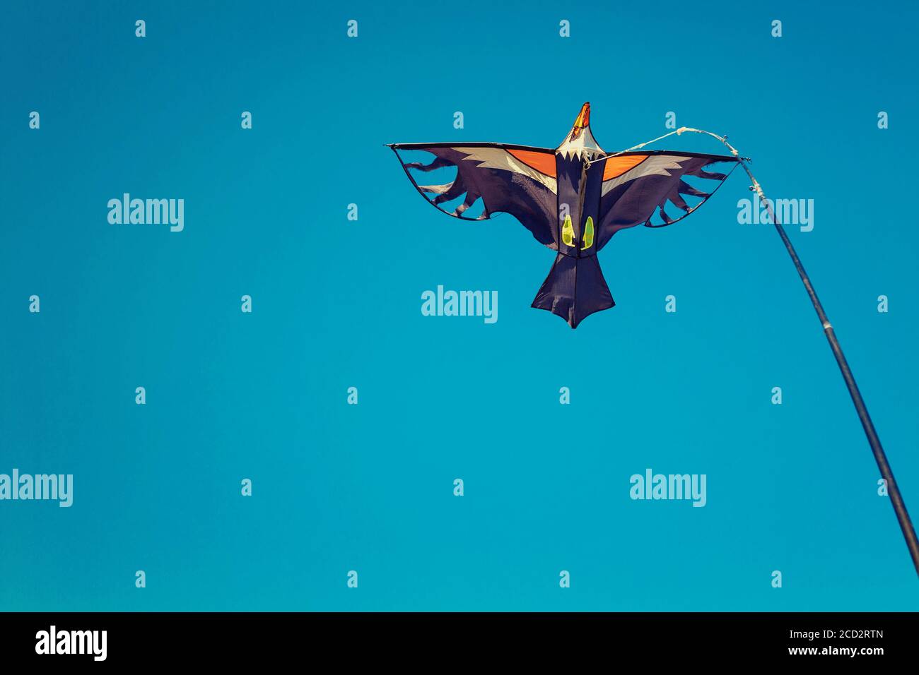 a kite soaring in the clear sky Stock Photo - Alamy