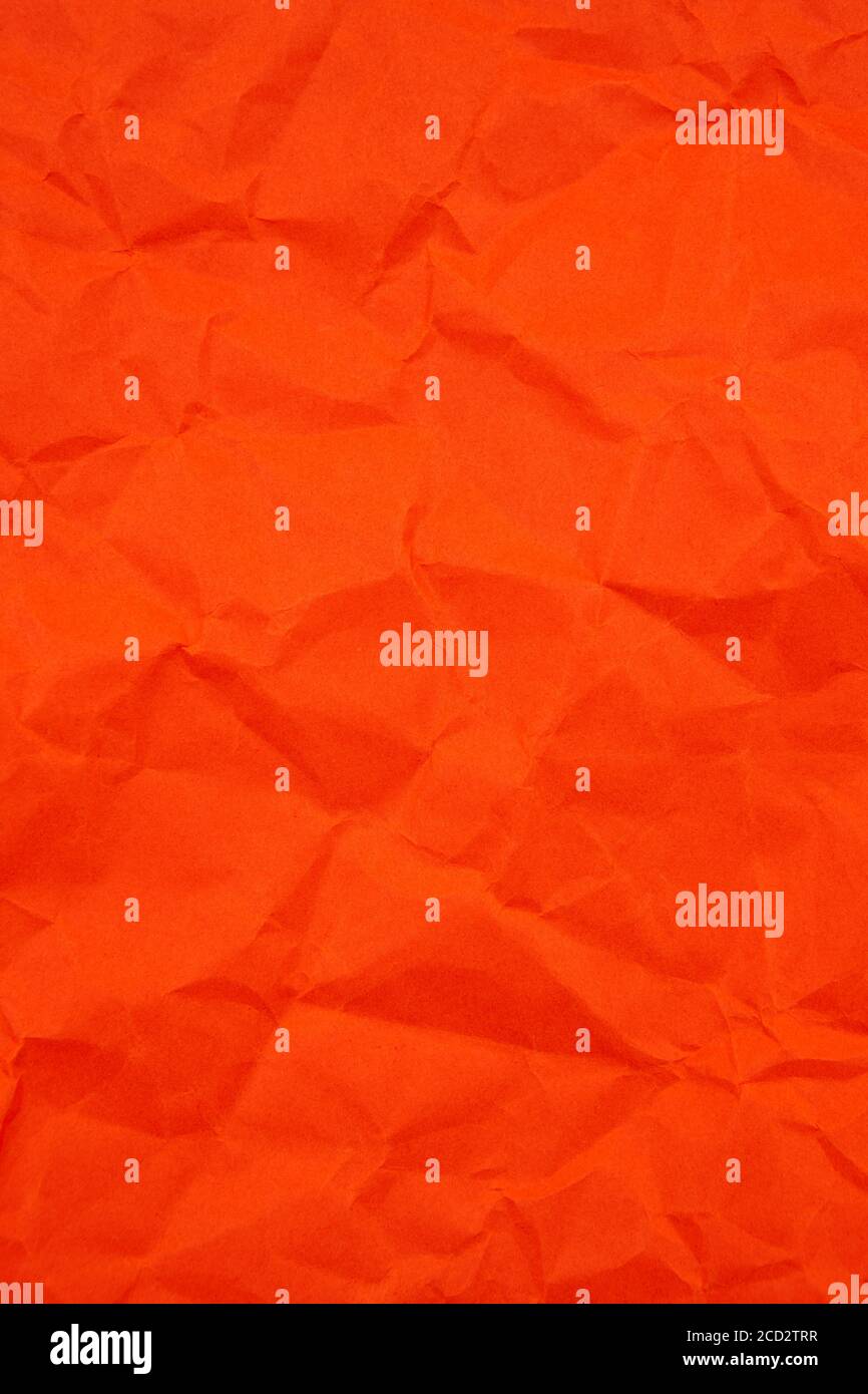 Textured crumpled red paper background. Vertical Stock Photo - Alamy