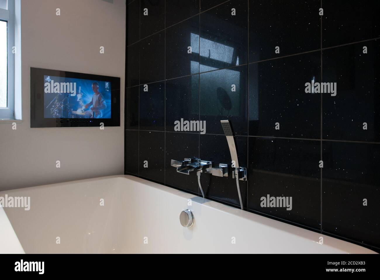 Bathroom with TV screen Stock Photo - Alamy