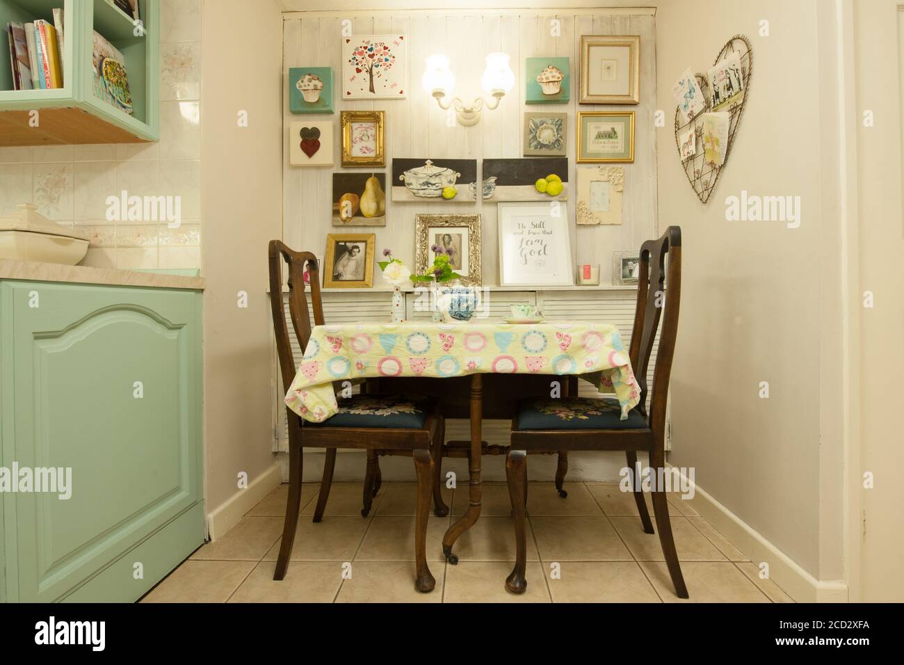 Dining table in kitchen Stock Photo - Alamy