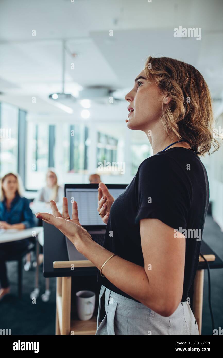 Young female executive speaking conference hi-res stock photography and ...