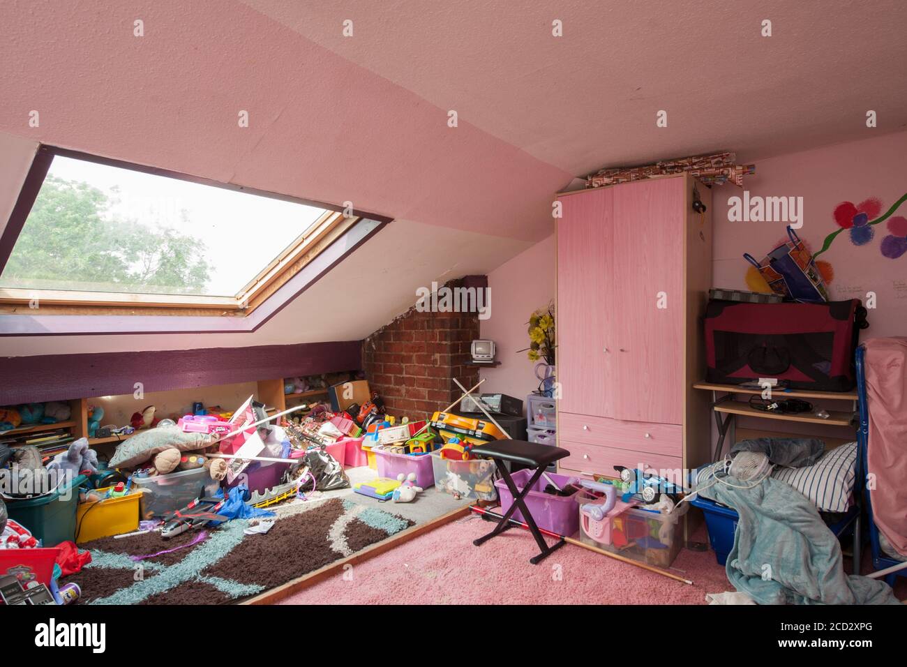 Messy loft room Stock Photo - Alamy