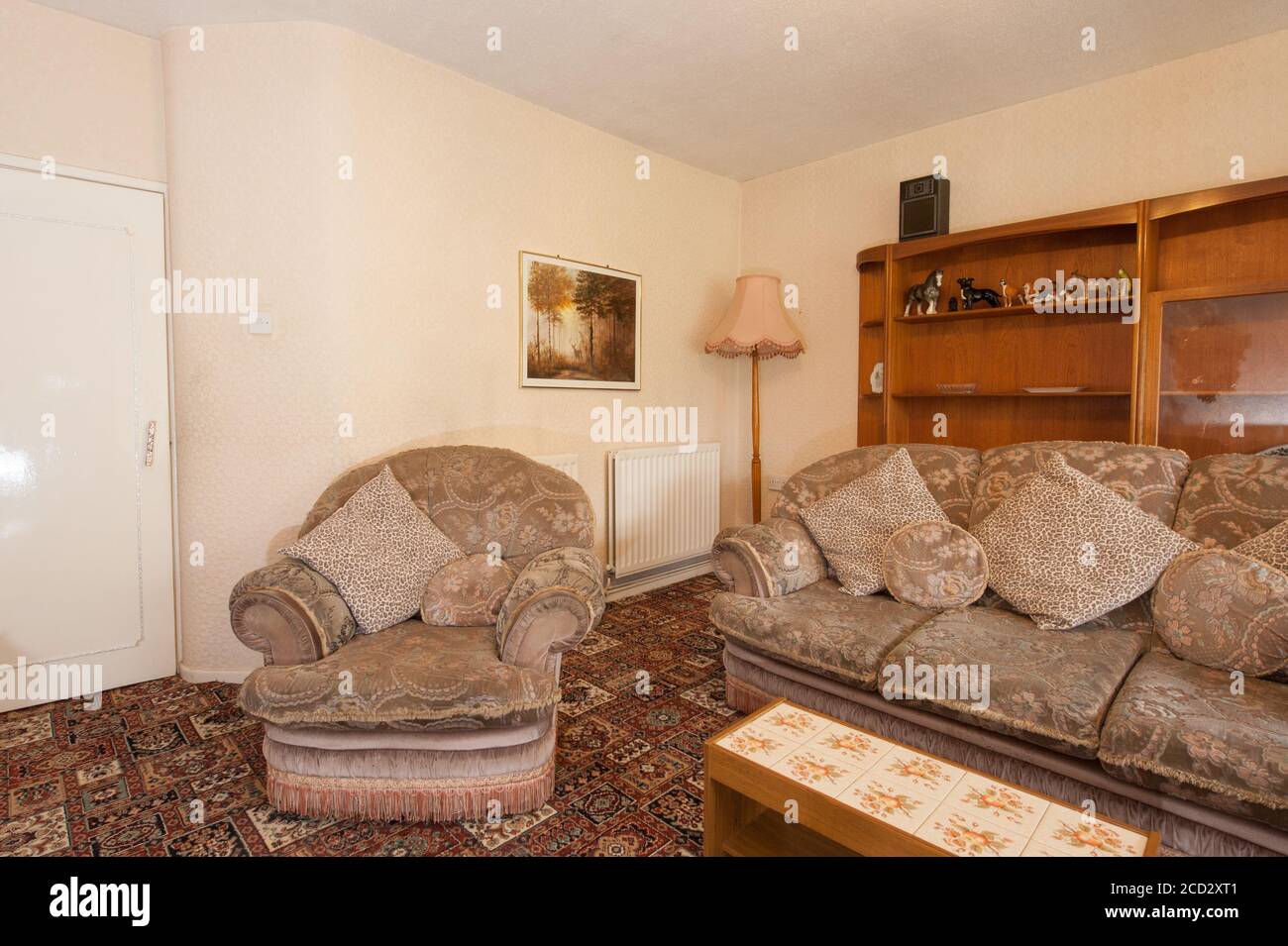 Living room with outdated furniture and old carpet Stock Photo - Alamy
