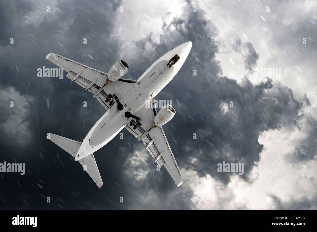 Airplane approaching on a landing in bad snow weather Stock Photo - Alamy