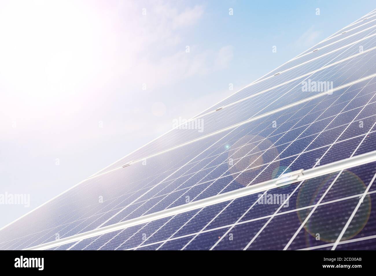 Solar panels on house roof against blue sky. Solar energy power. Sun ...