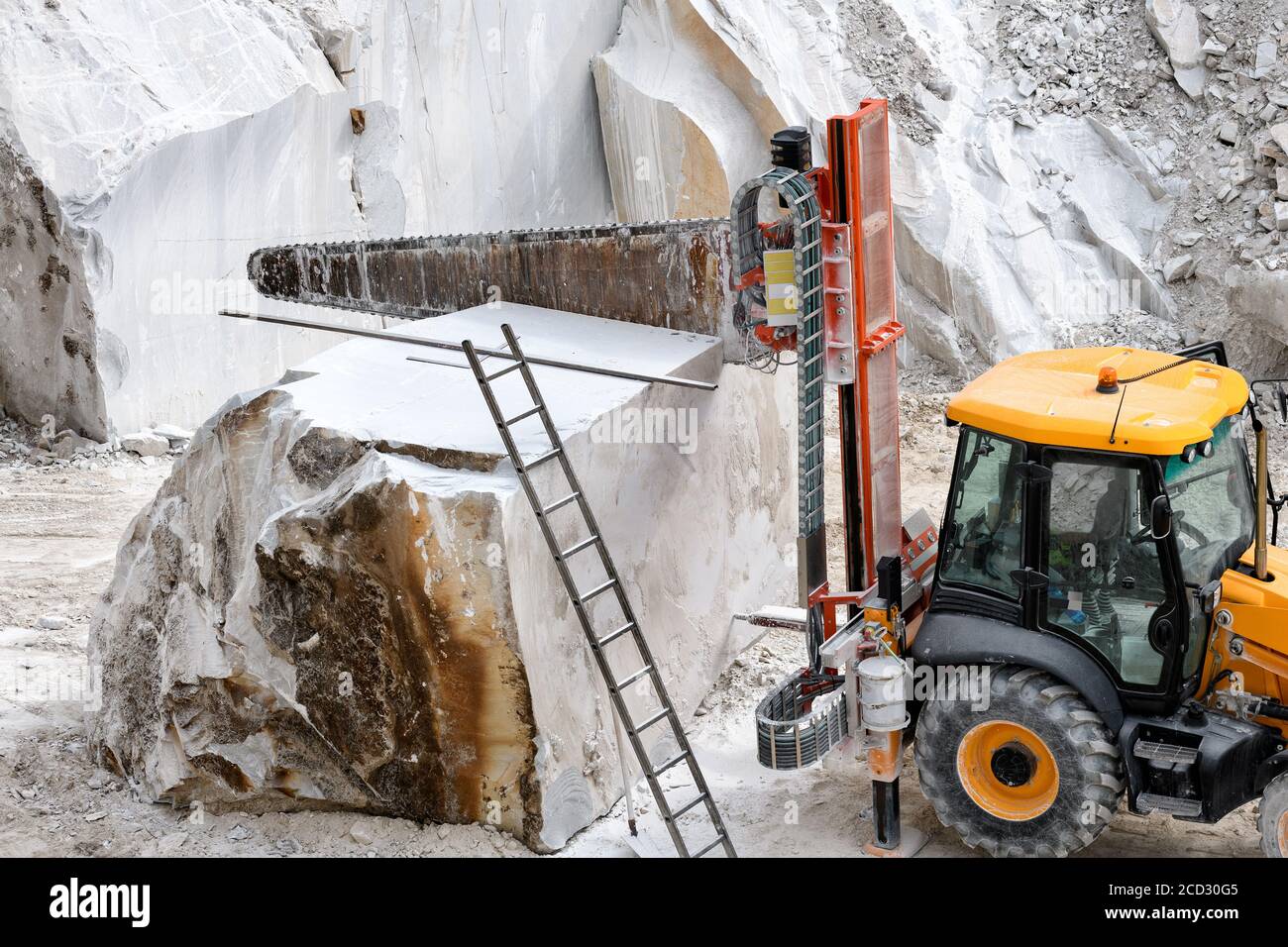 Heavy duty saw attached to a tractor for mobility for cutting blocks of ...