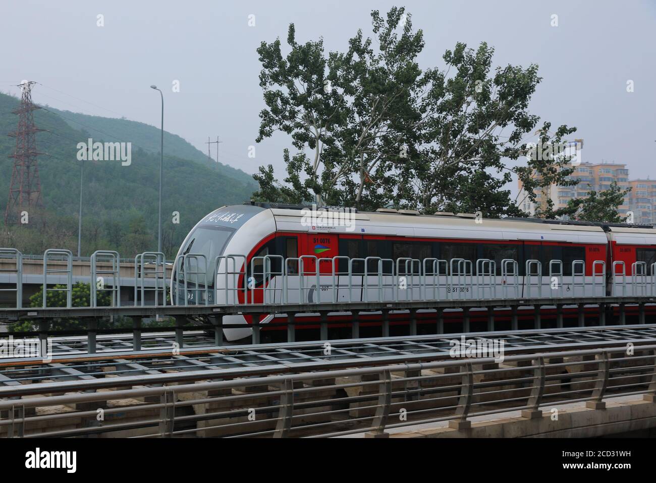 A train of S1 line, a medium low speed maglev line, passing by the ...