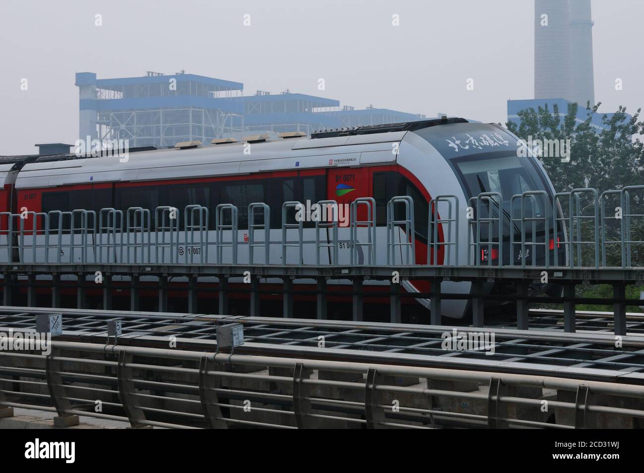 A train of S1 line, a medium low speed maglev line, passing by the ...