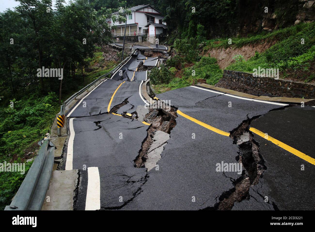 Road subsidence caused by continuous rainstorm is pictured in Chongqing ...