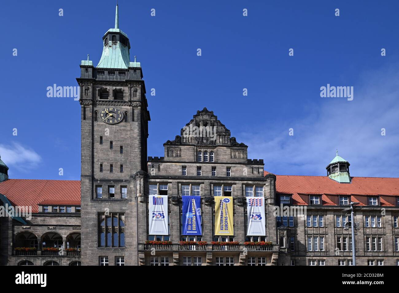 Chemnitz, Germany. 25th Aug, 2020. Flags advertising the application ...