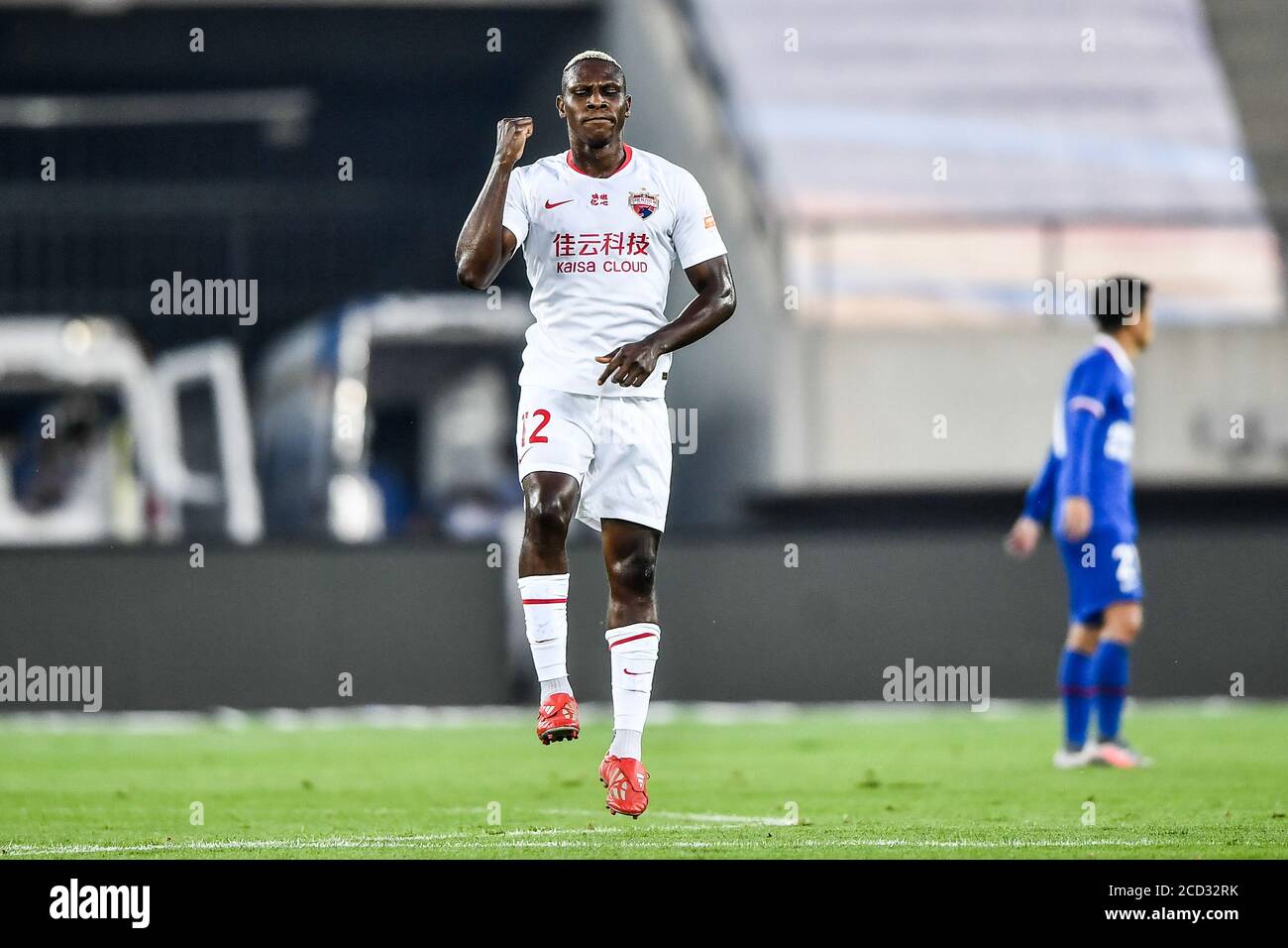Cameroonian football player John Mary of Shenzhen F.C. celebrates after ...