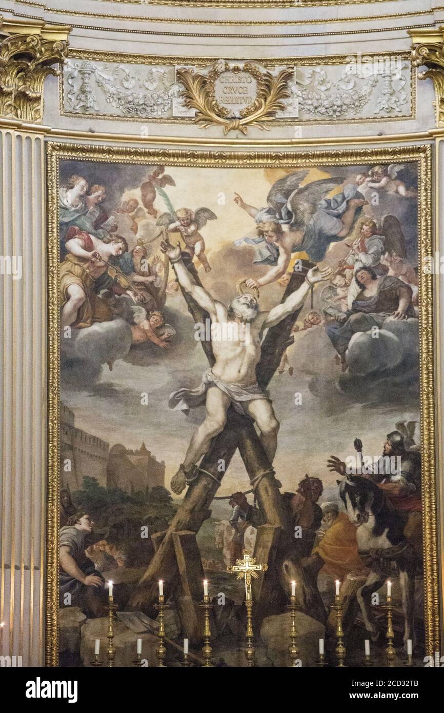 Vertical shot of a fresco illustrating the crucifixion of Saint Andrew ...