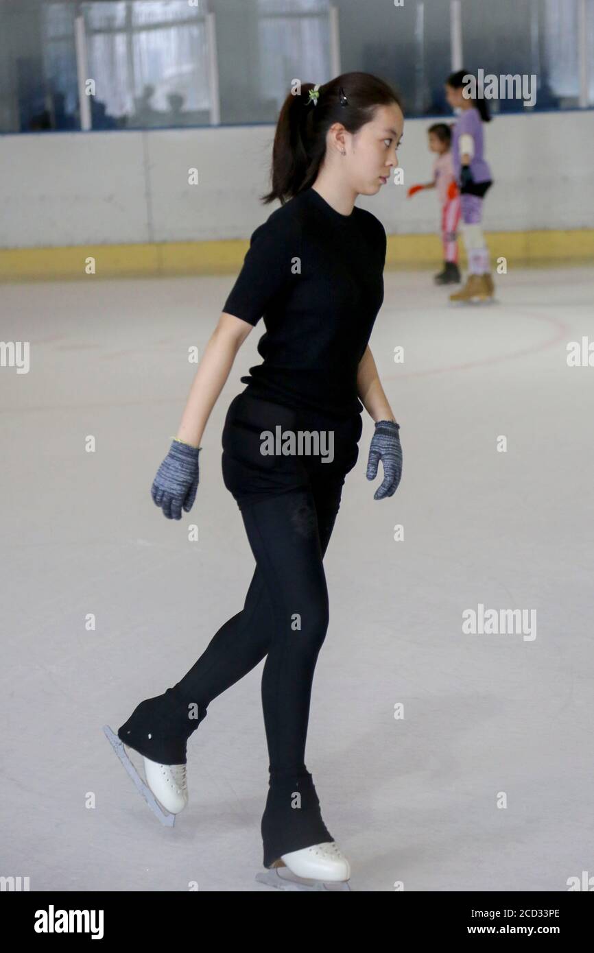 Citizens enjoy skating at an indoor ice rink to relieve scorching ...