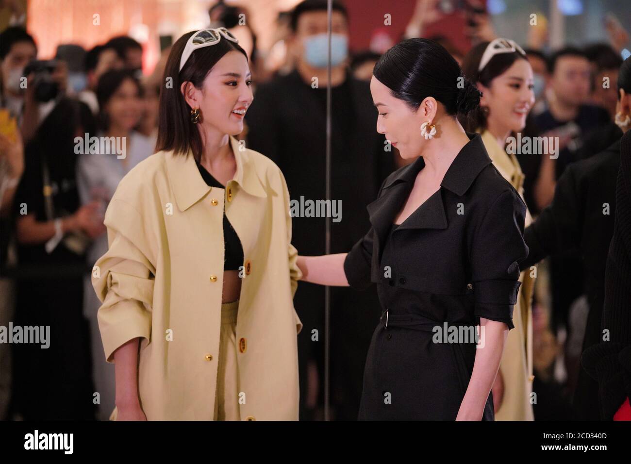 Chinese actress Yu Feihong, also known as Faye Yu, right and Chinese ...