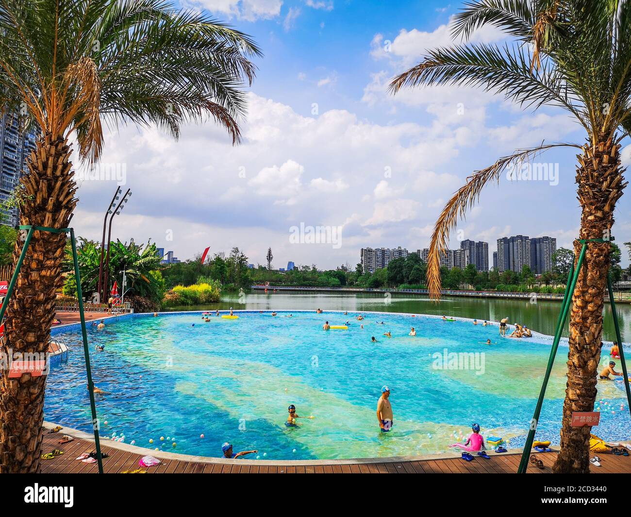 Aerial view of Sichuan's biggest outdoor swimming pool that is paved ...