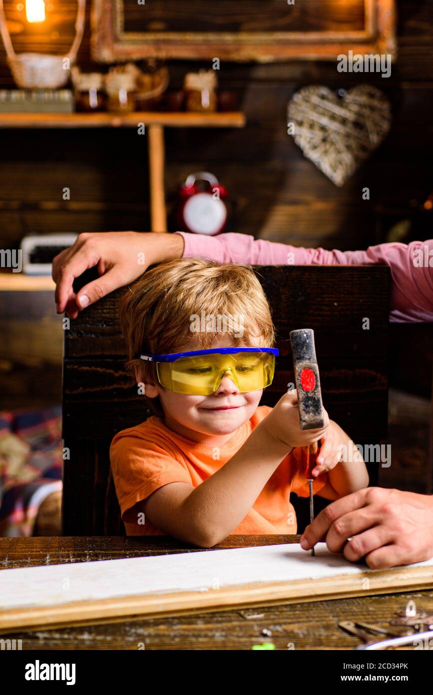 Small child boy repairing in workshop. Future profession. Kid with ...