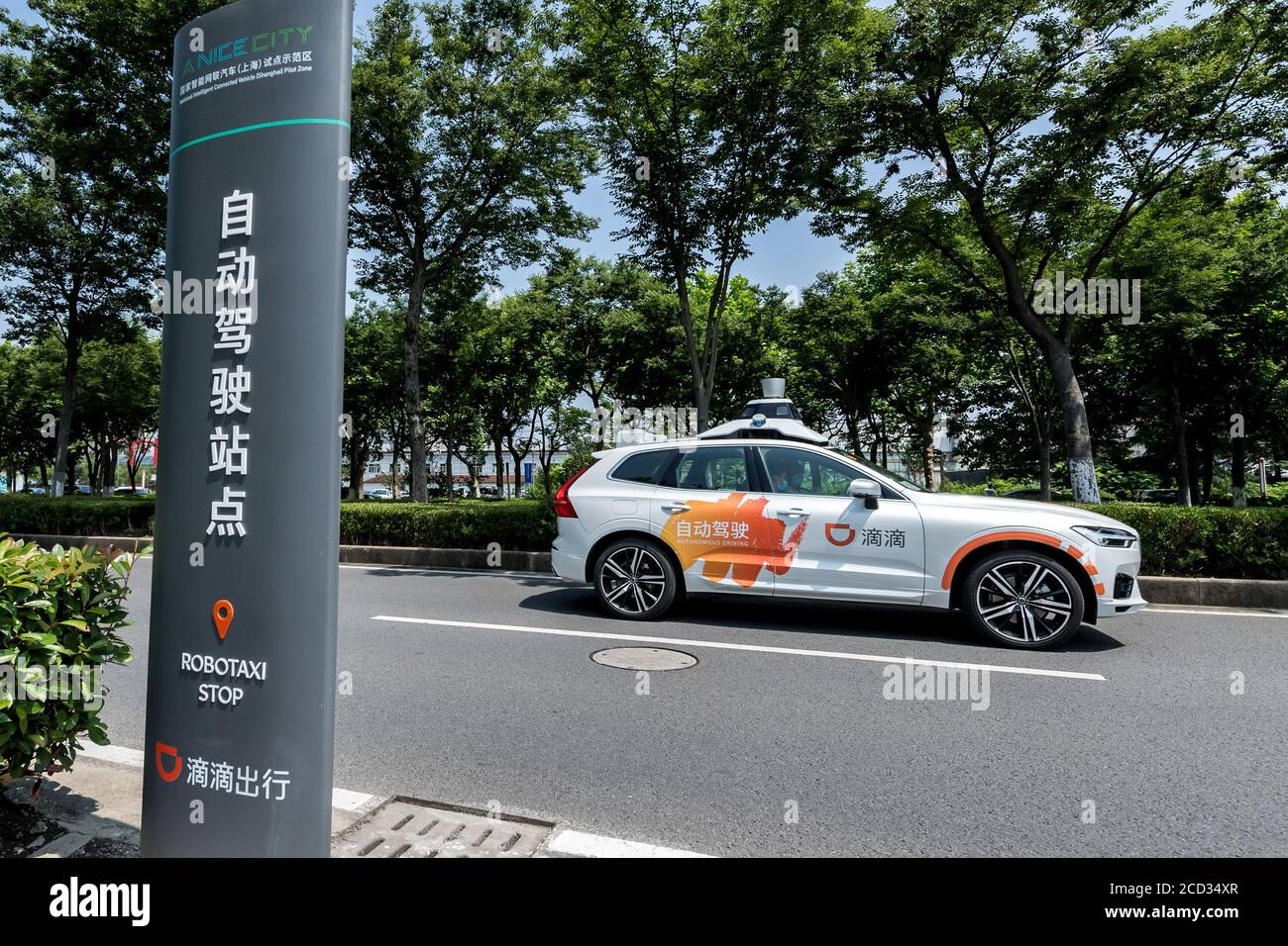 Self-driving cars developed by Didi, a Chinese company providing app ...