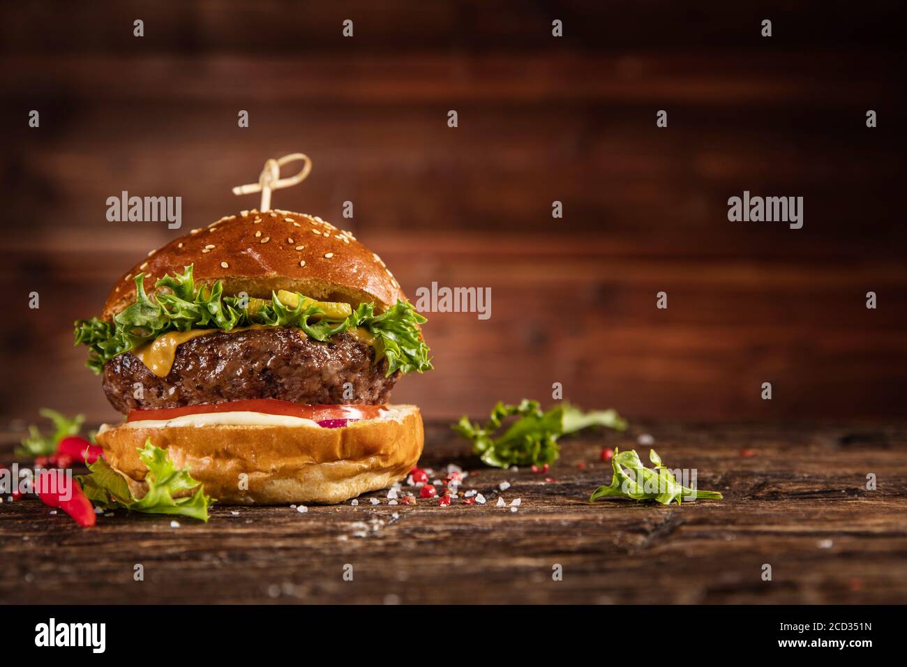Delicious hamburger, served on wood. Free space for text Stock Photo ...
