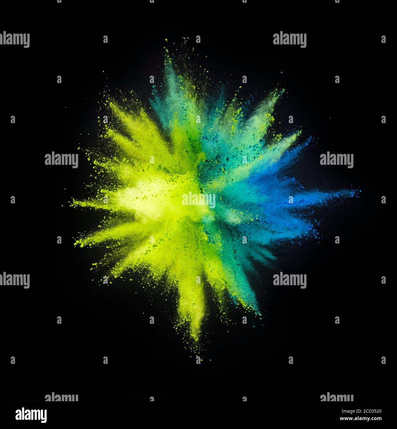 Colored powder explosion isolated on black background Stock Photo - Alamy