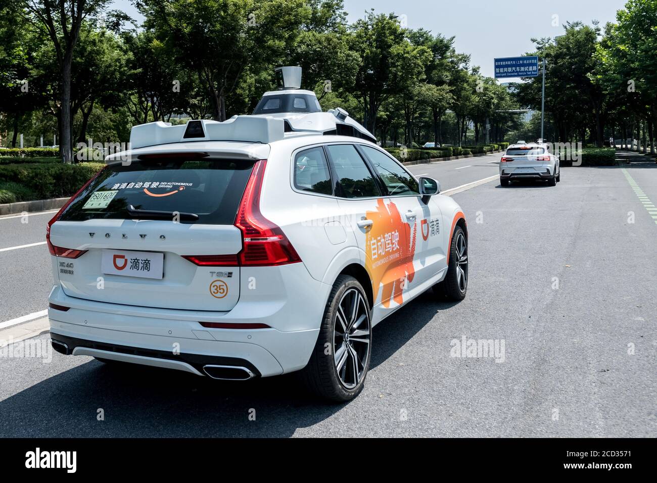 Self-driving cars developed by Didi, a Chinese company providing app ...