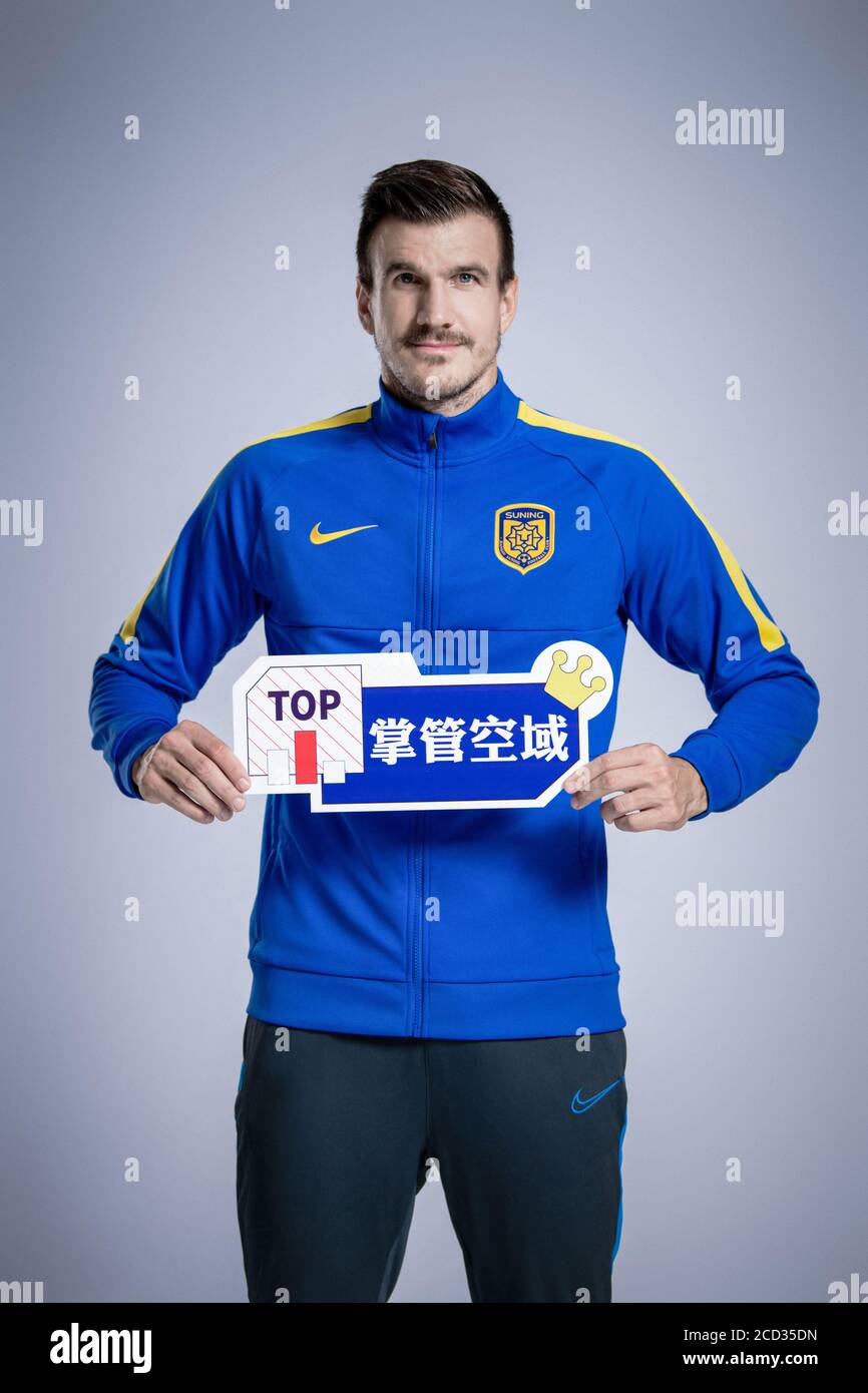 Croatian football player Ivan Santini of Jiangsu Suning F.C. poses to ...