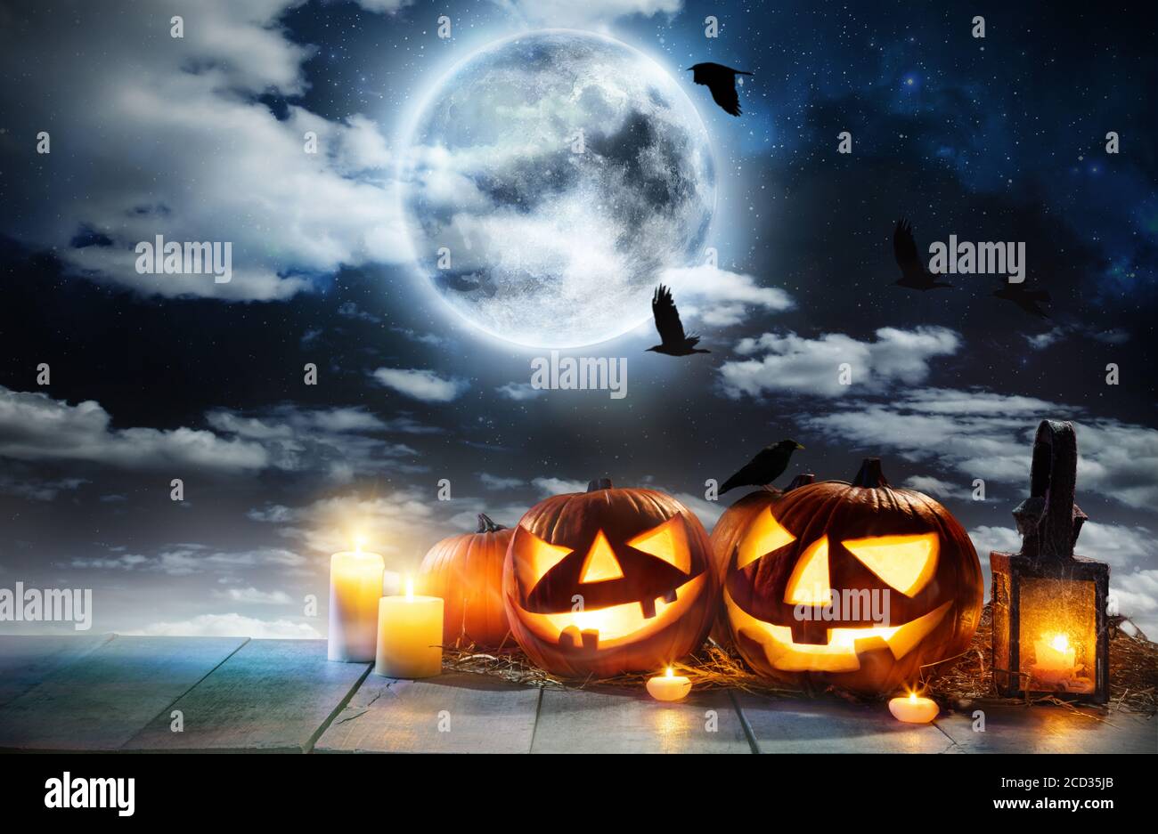 Spooky halloween pumpkin placed on wooden planks. Scary halloween ...