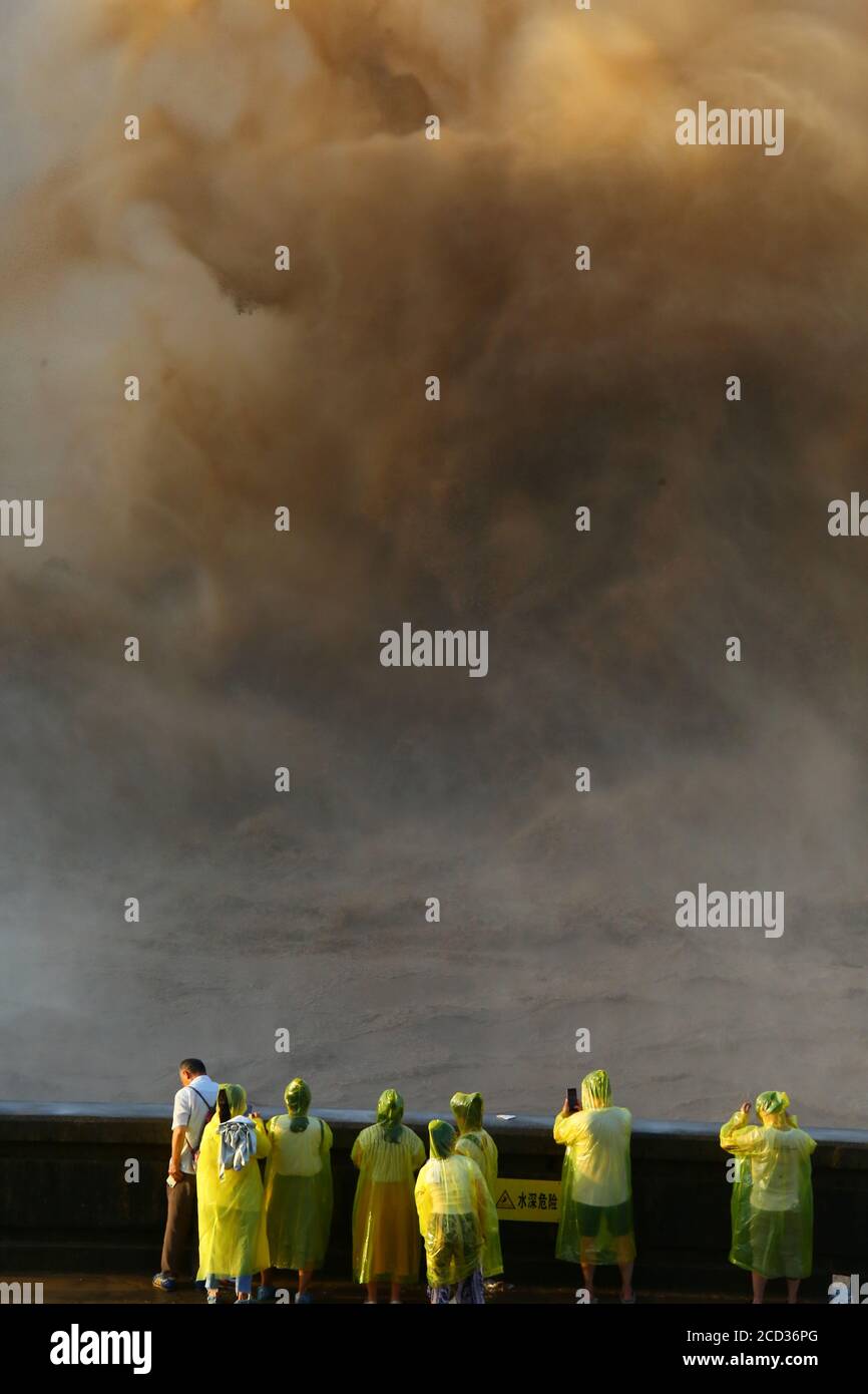 Aerial view of Xiaolangdi Dam discharging flood and sand after days of ...