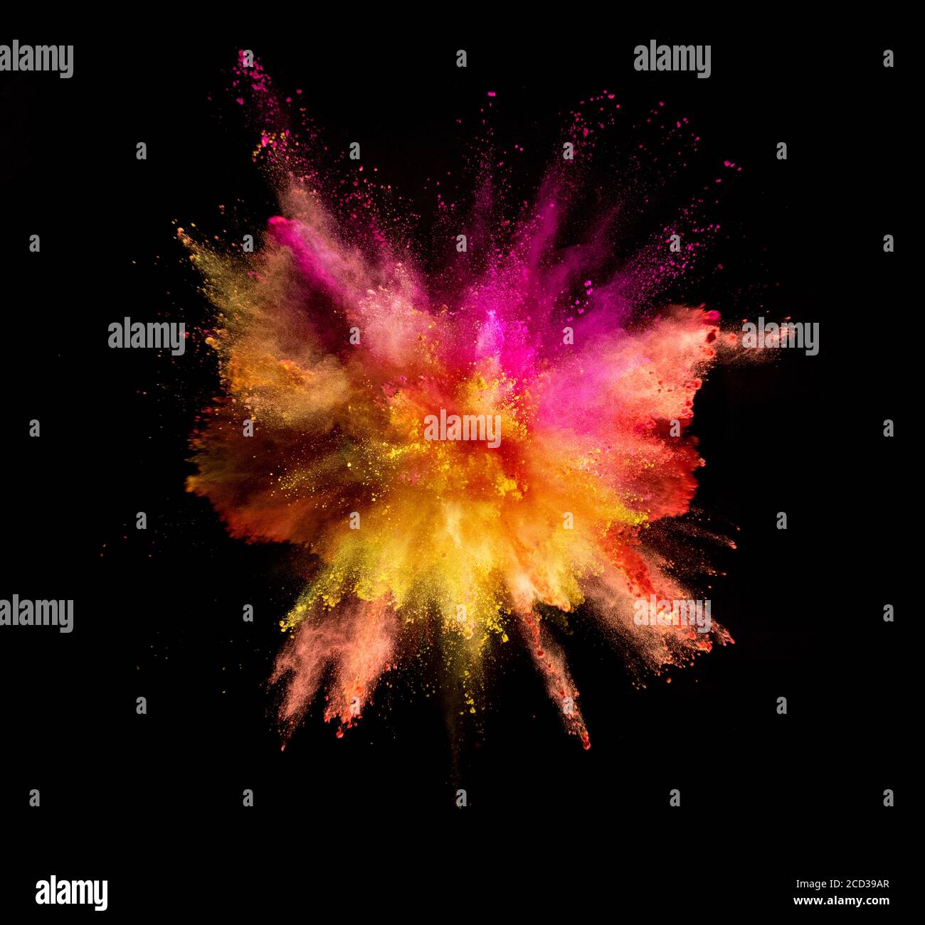 Explosion of coloured powder isolated on black background Stock Photo ...