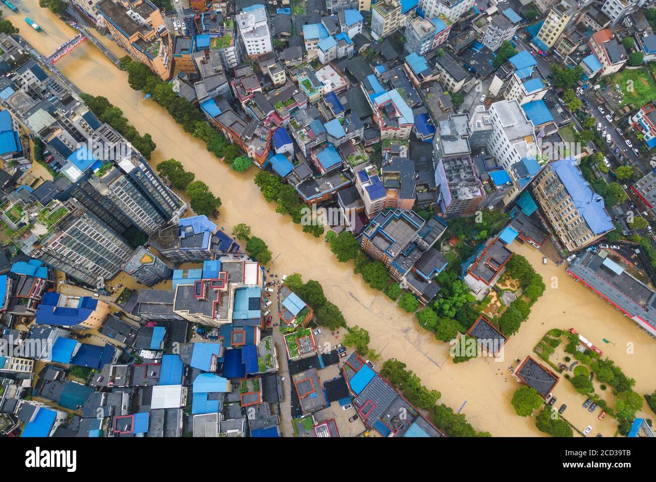 Aerial view of villages and road flooded by heavy rainfall in Xiangxi ...