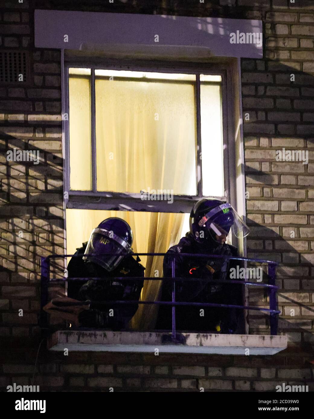 Metropolitan Police officers during a raid on a property on York Way in ...