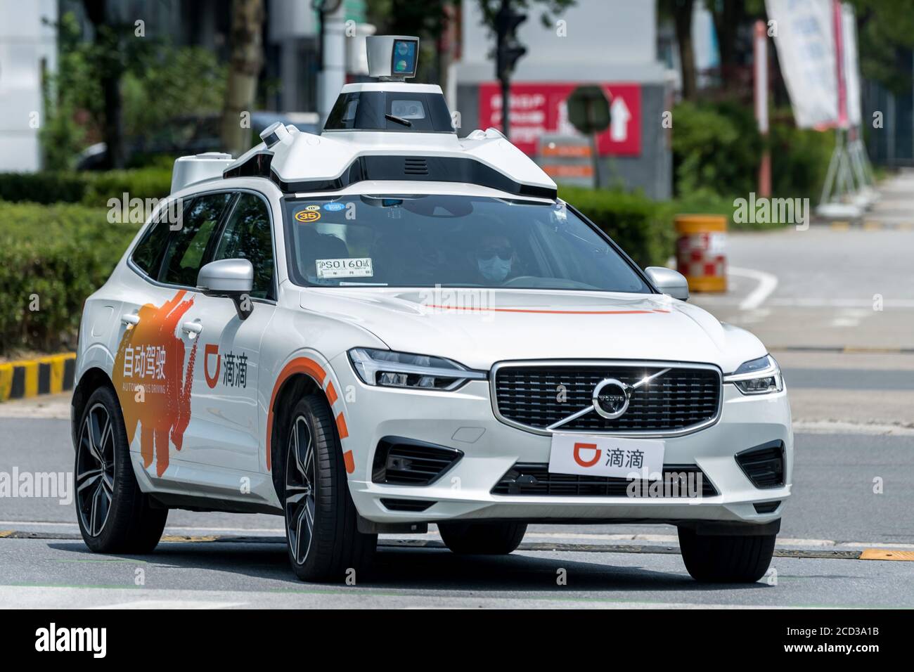 Self-driving cars developed by Didi, a Chinese company providing app ...