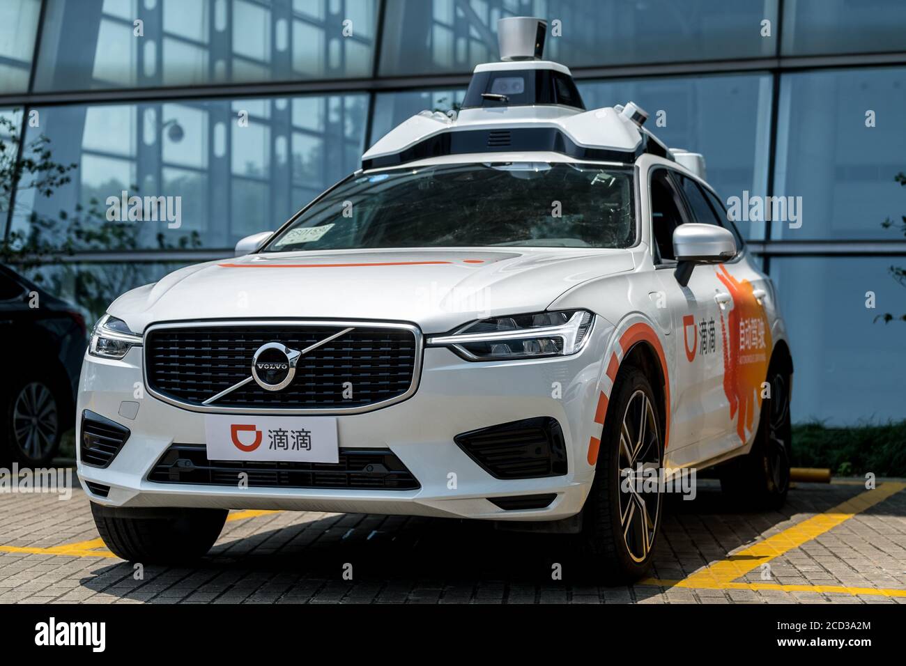 Self-driving cars developed by Didi, a Chinese company providing app ...