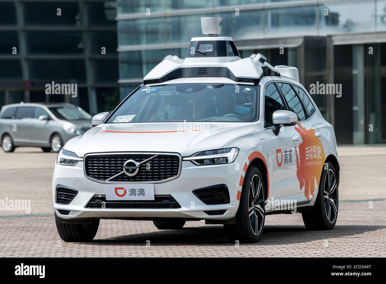 Self-driving cars developed by Didi, a Chinese company providing app ...