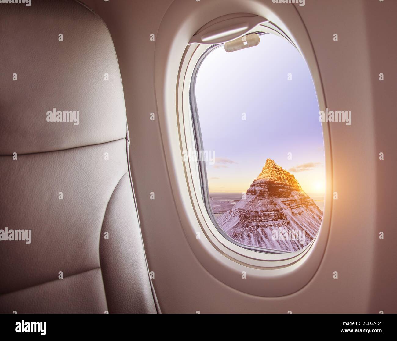 Airplane interior with window view of Kirkjufell mountain, Iceland ...