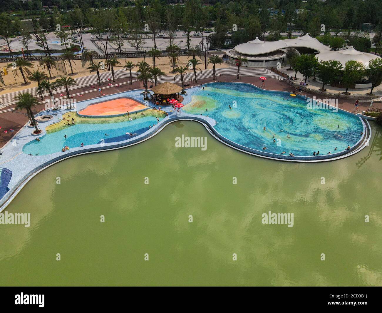 Aerial view of Sichuan's biggest outdoor swimming pool that is paved ...